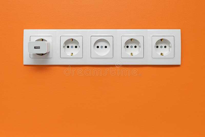 White Five-way Wall Power Socket on White Wall Stock Photo - Image of ...