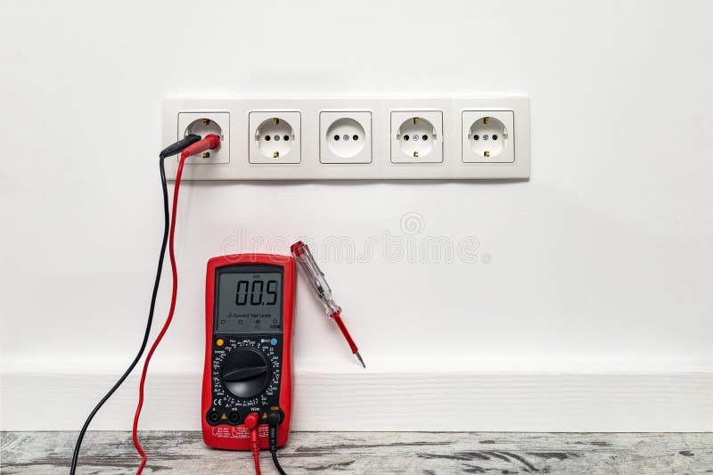 Checking the Voltage of Electricity at a Home Outlet Stock Image ...