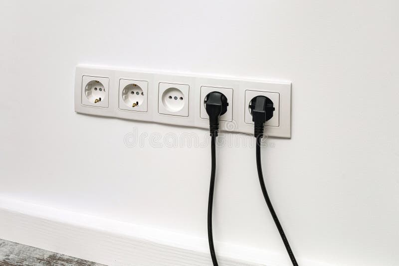 White Five-way Wall Power Socket on White Wall Stock Photo - Image of ...