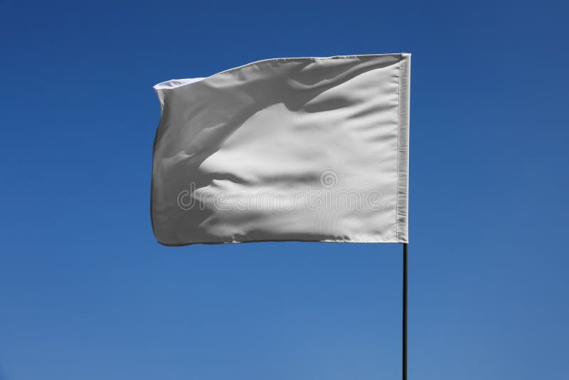 White Flag Fluttering Against Blue Sky on Sunny Day Stock Image - Image ...