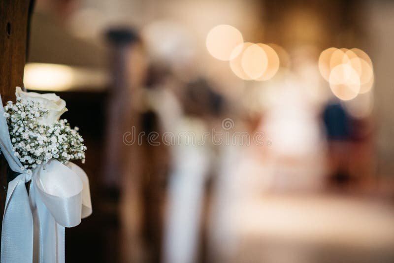 White Flower in the Foreground Against a Church Backdrop, Perfect for ...