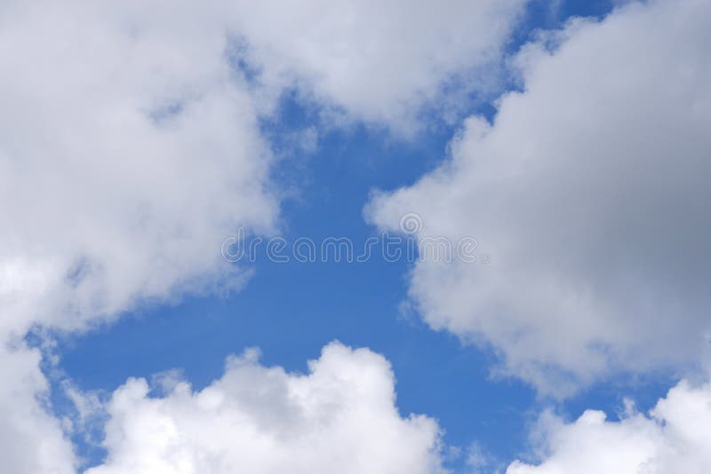 White Fluffy Clouds with Blue Sky and Sun Light for Background Texture ...