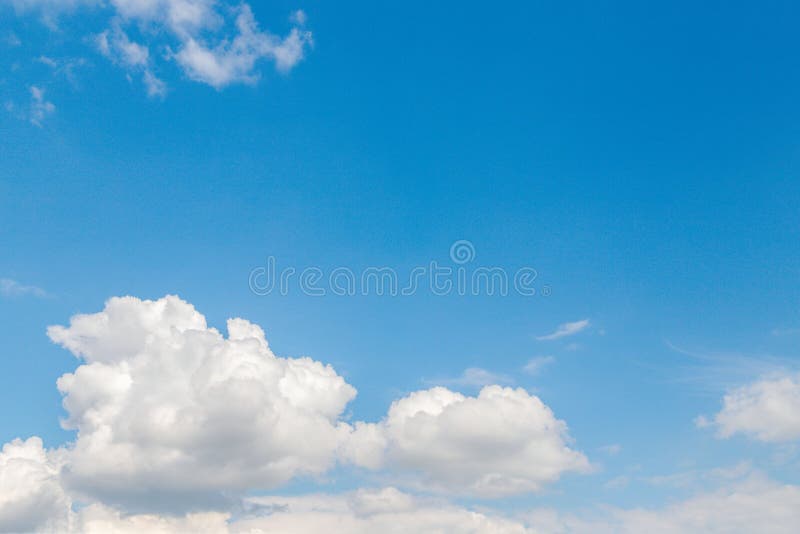 White Fluffy Clouds in a Clear Light Blue Sky Stock Image - Image of ...