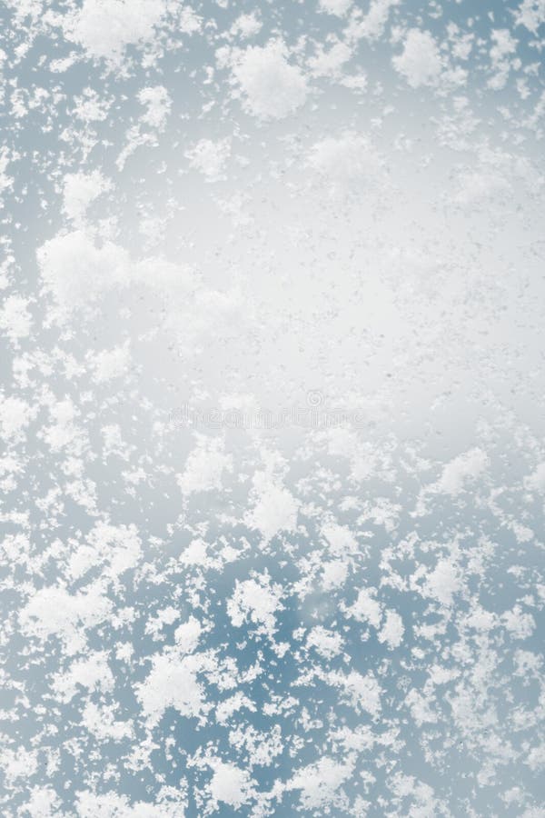 White Fluffy Snow Flakes on the Glass Window. Macro Photo Stock Photo ...