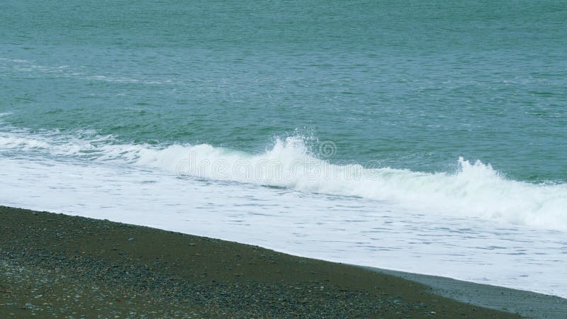 White Foam Wave Beaching on Sea Shore Pebble. Pebble Beach Foam Sea ...