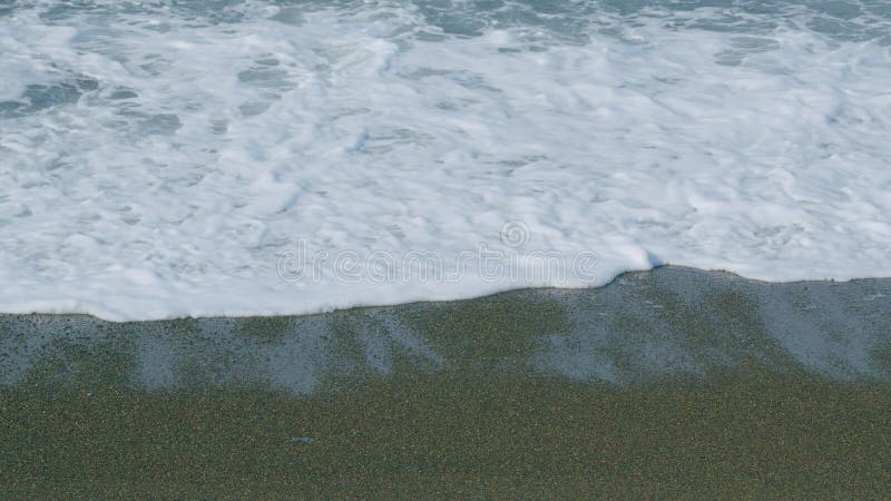 White Foam Wave Beaching on Sea Shore Sand. Sand Beach Foam Sea Surf ...
