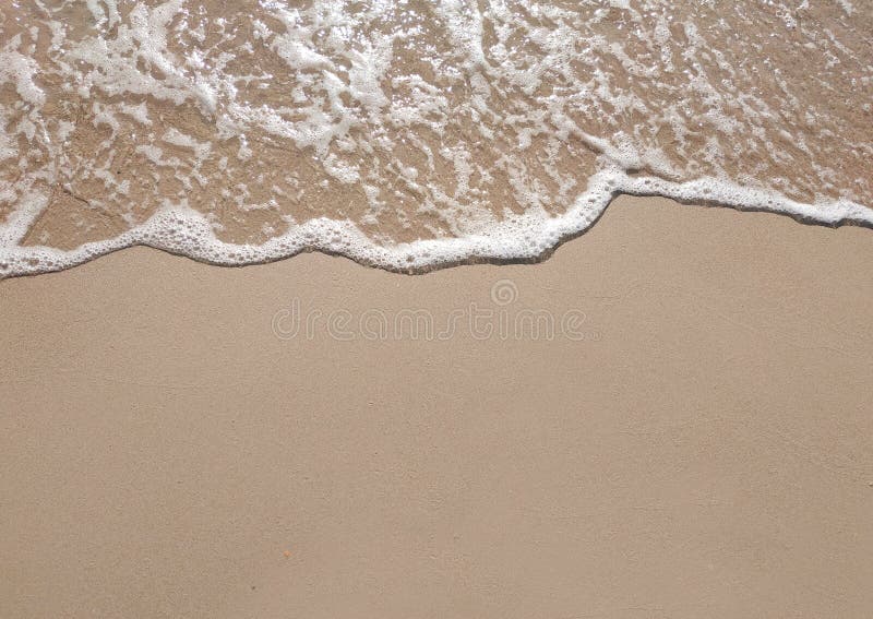 White Foamy Wave on the Beach Sand. Top View Stock Image - Image of ...