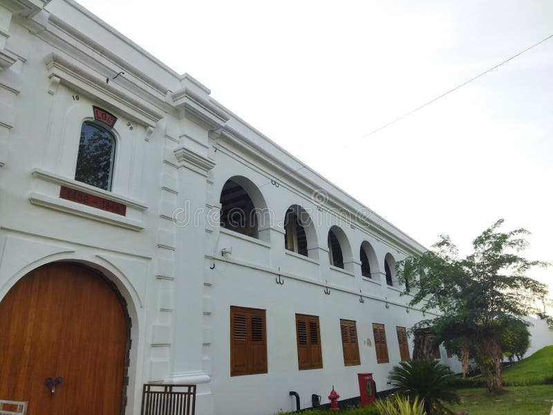 A White Fortress Building with a Courtyard in Front Stock Image - Image ...