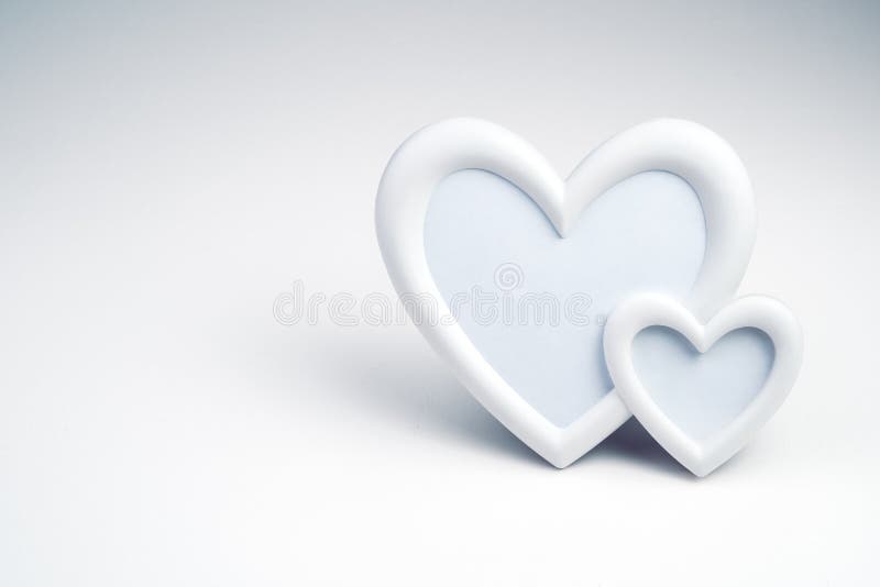 White Frame of Two Hearts on a White Background. Stock Image - Image of ...