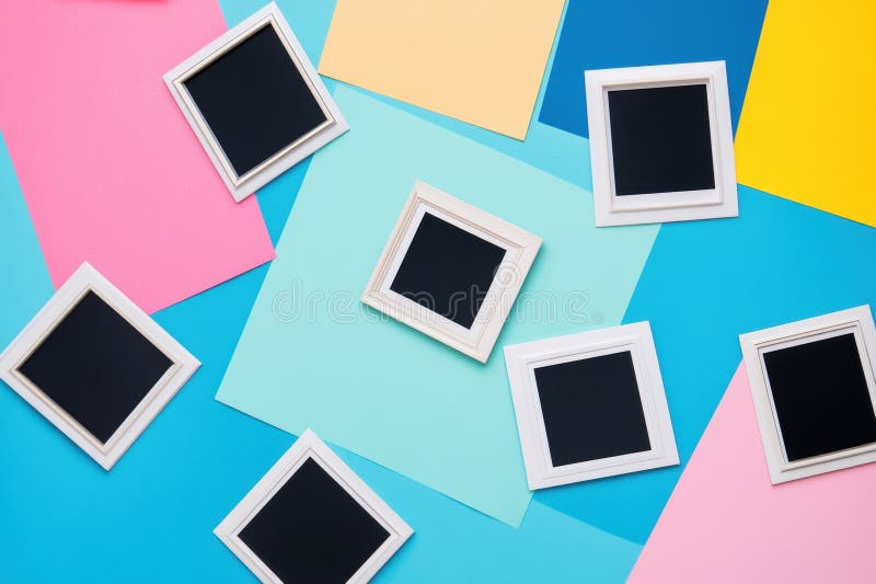 Scattered White Polaroid Frames on Colorful Flat Surface with Space for ...