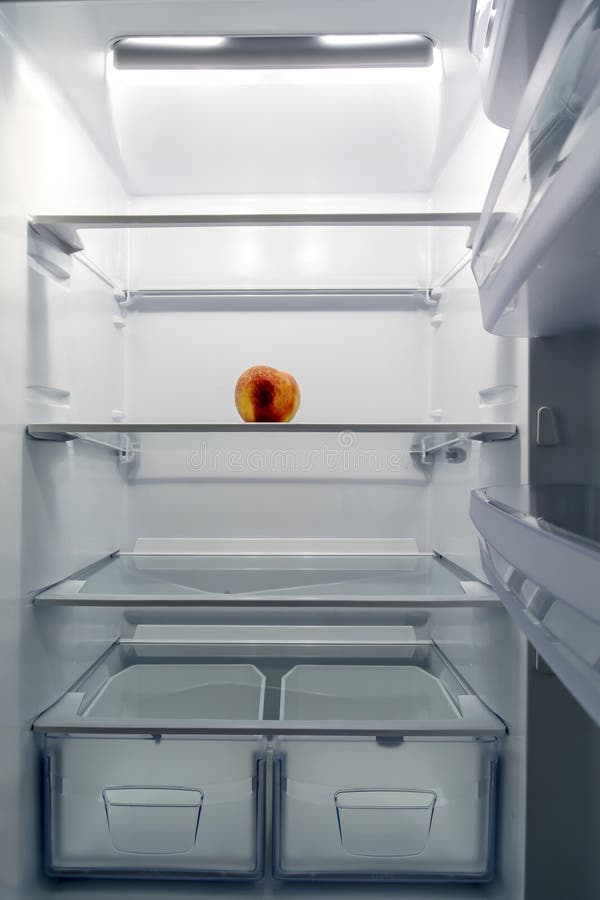 White Fridge with only a Peach Inside Stock Photo - Image of peach ...