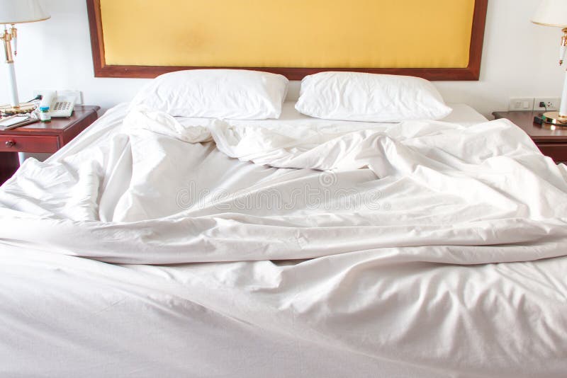 White frowzy bed stock image. Image of small, blanket - 85312889
