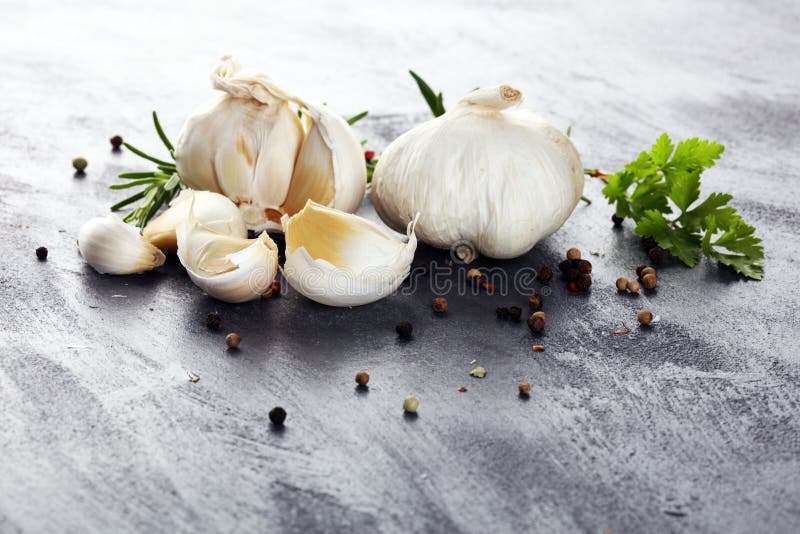 White Garlic on a Rustic the Table and Organic Garlic Pieces Stock ...