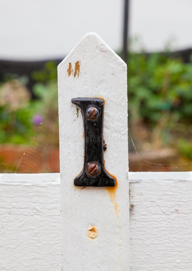 White Gate Post with Number One in Balck. Stock Image - Image of gate ...