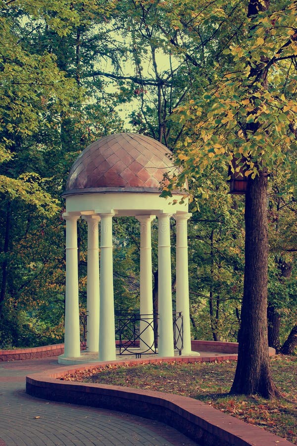 White Gazebo in the City Park Stock Photo - Image of yellow, gazebo ...