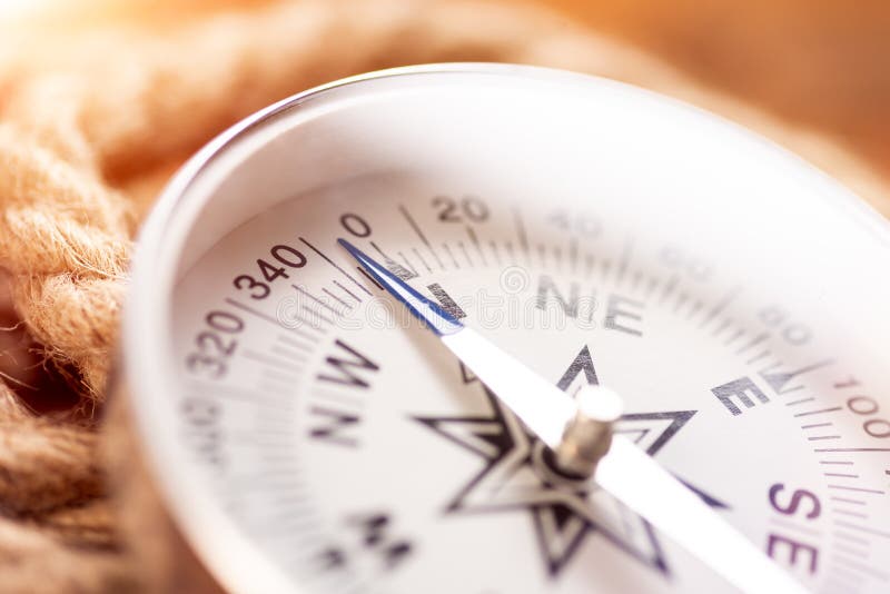 White Geographic Comp Close Up. Compass and Rope Stock Image - Image of ...