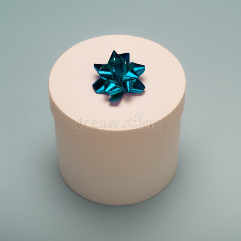 Gift box on blue or cyan stock photo. Image of puzzle - 202404728