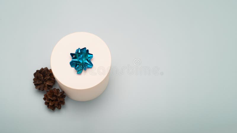Gift box on blue or cyan stock image. Image of shape - 202404721
