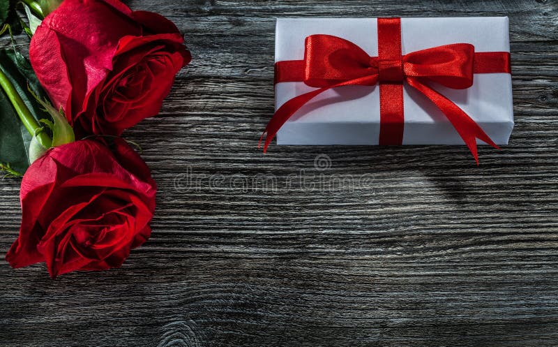 White Gift Boxes Red Roses on Wooden Board Stock Image - Image of ...