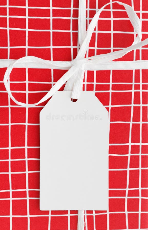 White Gift Tag Mockup on a White Christmas Gift Stock Photo - Image of ...
