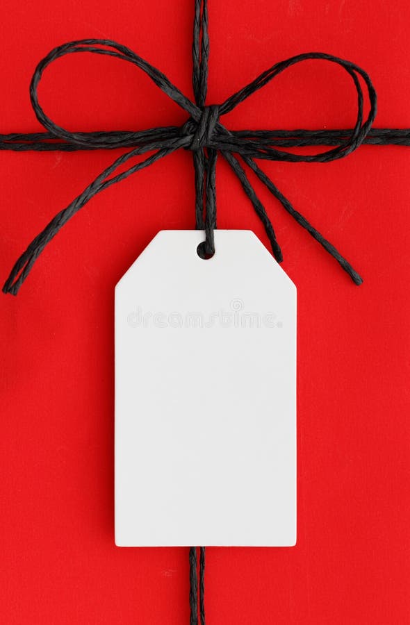 White Gift Tag Mockup on a White Christmas Gift Stock Photo - Image of ...