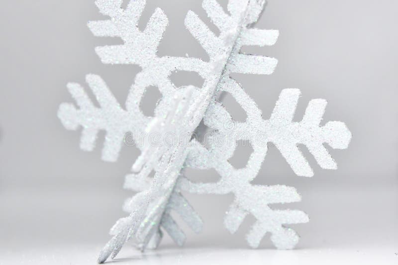 White Glitter Snowflake on White Background Stock Image - Image of ...