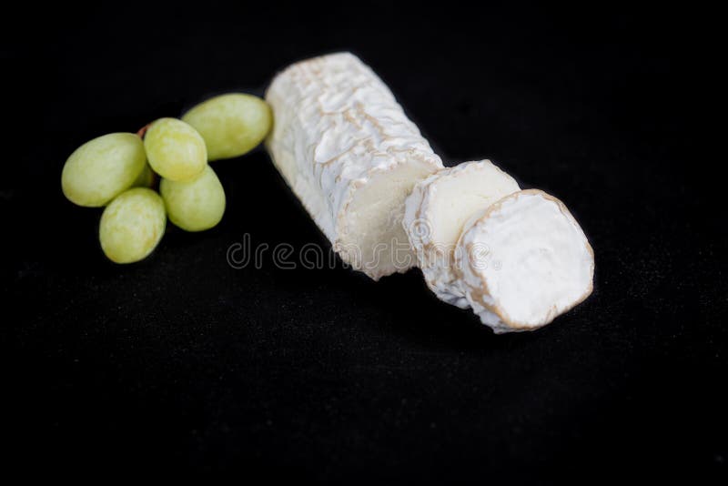 White Goat Cheese on a Black Background. Fresh Goat Cheese with Copy ...