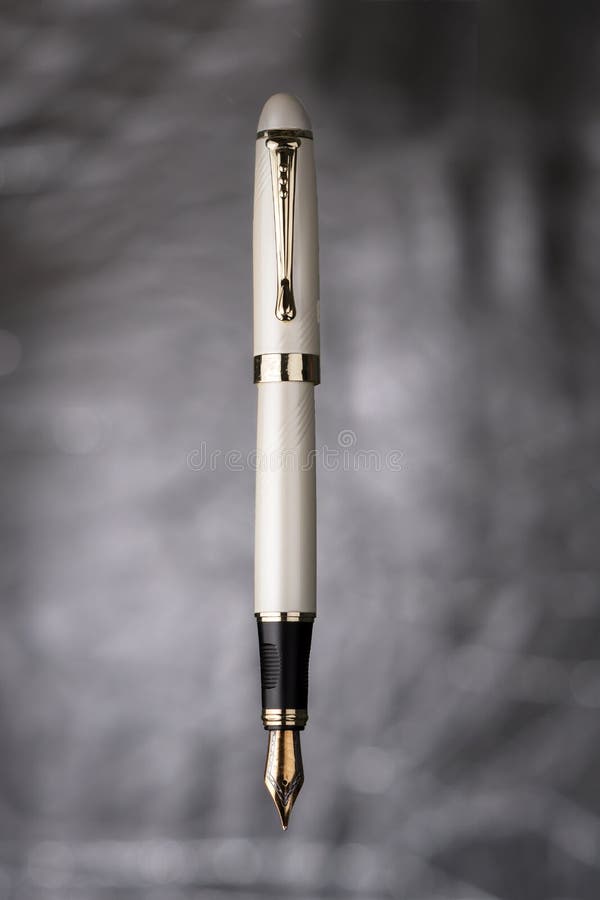 White and Gold Fountain Writing Pen Stock Image - Image of handwriting ...