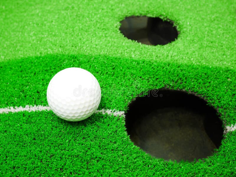 White golf ball on turf stock photo. Image of texture - 61702372
