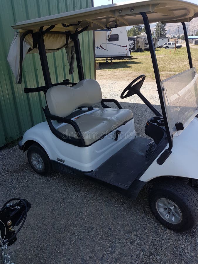 White golf cart at event editorial photography. Image of event - 155676547