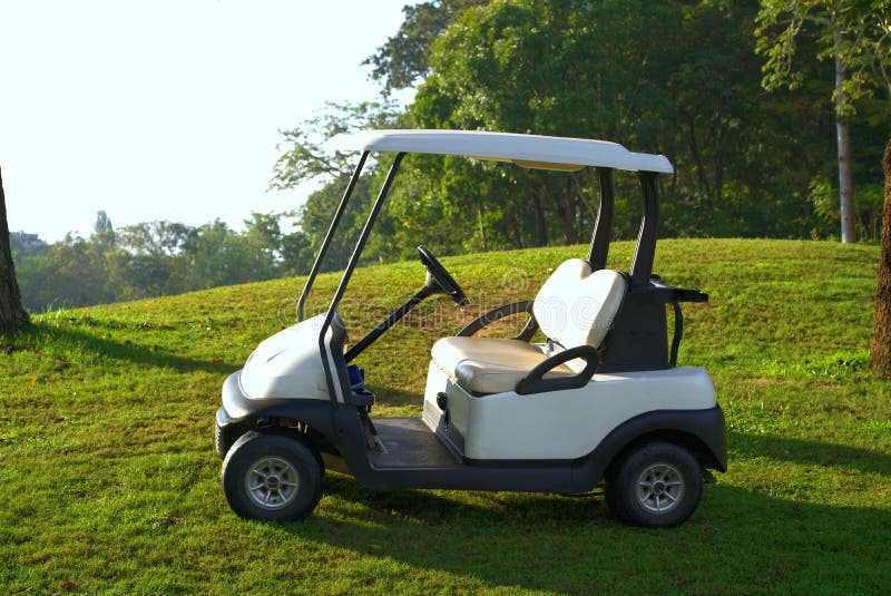 White Golf Cart Parked on the Golf Course with Morning Sunlight Stock ...