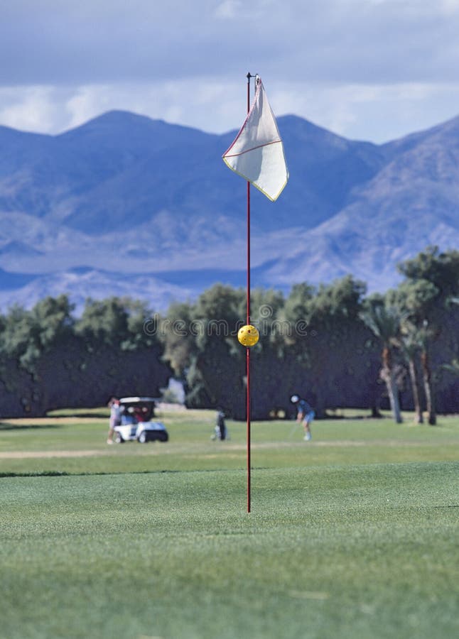 A White Golf Flag Blowing in the Wind Stock Image - Image of flag ...