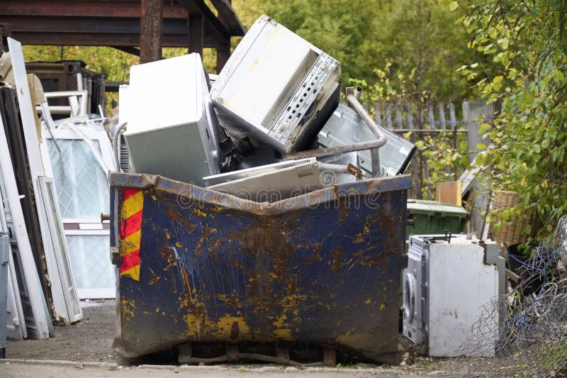 White Goods in Skip for Disposal at Dump Site Stock Image - Image of ...