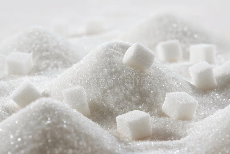White Granulated Sugar and Cubes of Refined Sugar Close-up. Shape of ...