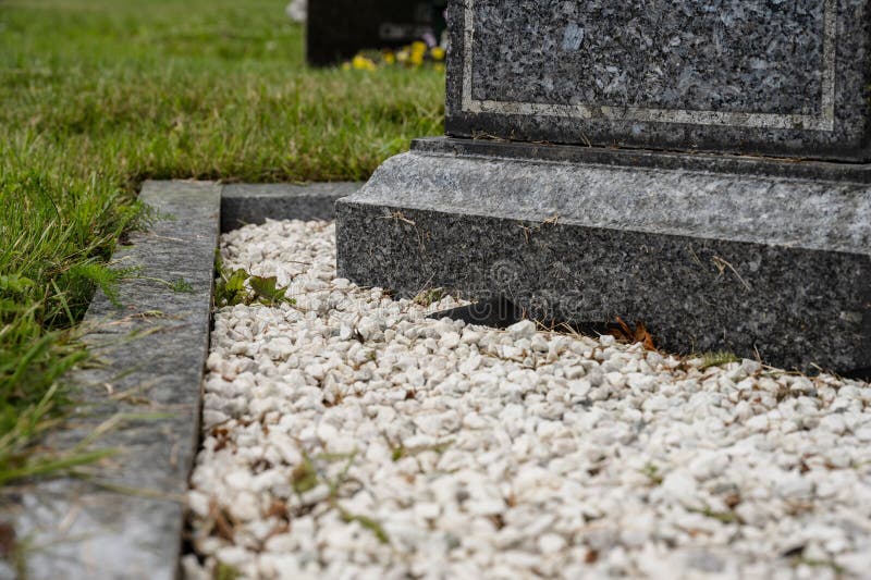 White Gravel Stone at the Foot of a Grave Stone.. Stock Image - Image ...