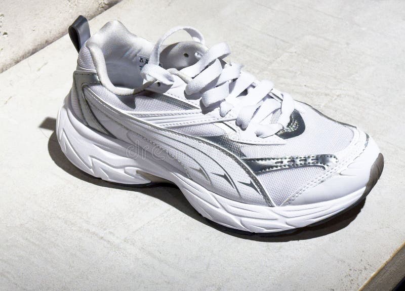 White and Gray Athletic Running Shoe on Concrete Surface Editorial ...