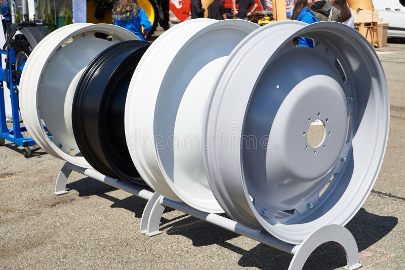 White and Gray Pressed Rims for Tractor Stock Photo - Image of vehicle ...
