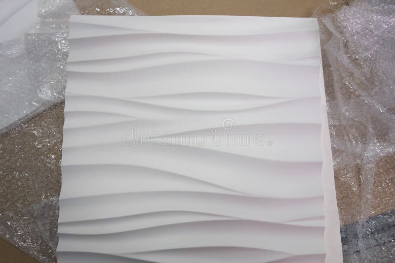 White Gypsum Tiles for Wall and Ceiling Cladding in the Room. Stock ...