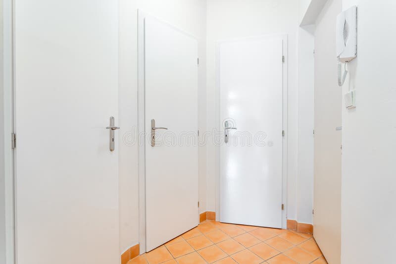 White Hallway with Doors in a Modern Apartment Stock Image - Image of ...