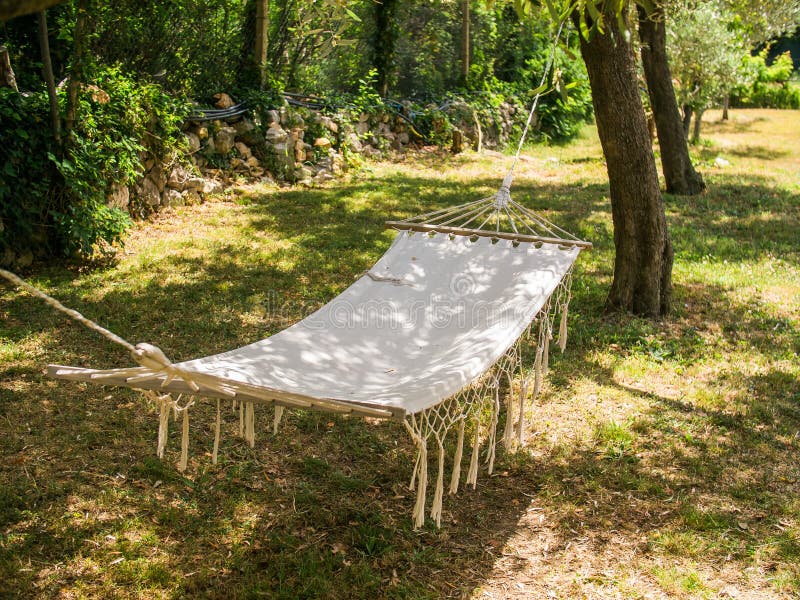 White Hammock Hanging Under Tree in Countryside - Cottagecore and ...