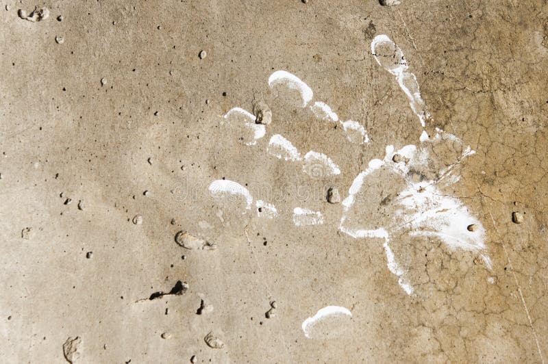 White Hand Paint Prints on Dark Rough Wall Stock Image - Image of ...
