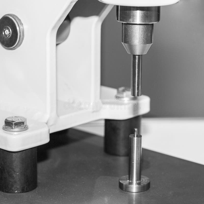 White Hand Press To Set Rivets on the Table Stock Photo - Image of ...