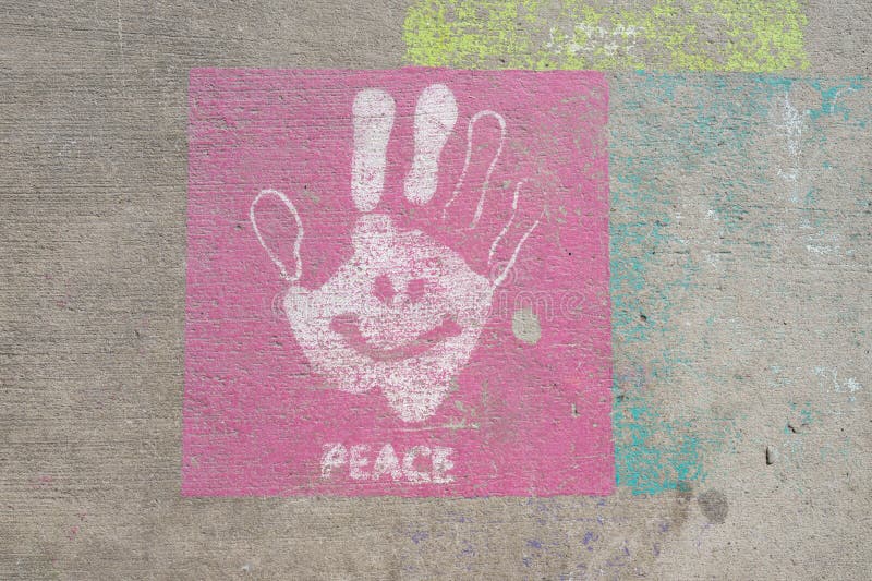 White Handprint on Pink Square with Eyes and a Smile. Peace Text at ...