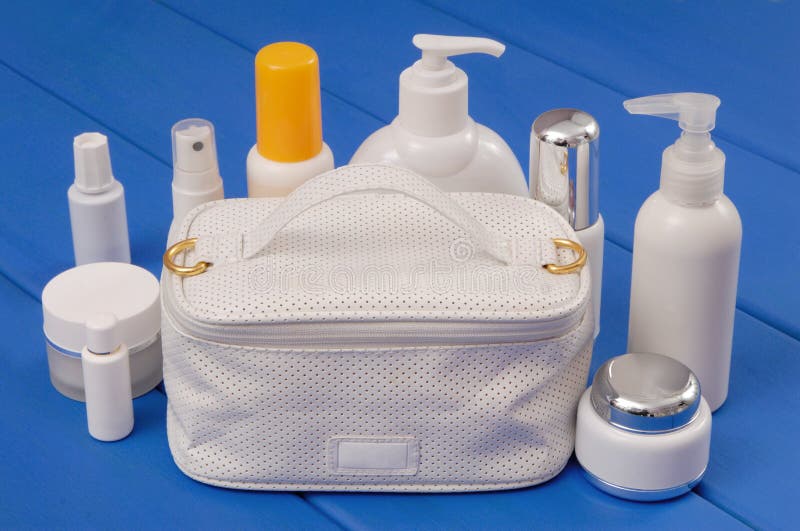 A White Handbag and Cosmetic Preparations Stock Photo - Image of ...