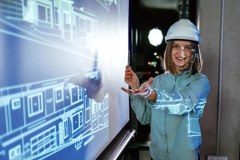 In White Hard Hat. Female Architect is Showing Construction Site Plan ...