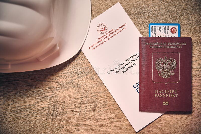 White Hardhat, Russian Foreign Passport and Turkish Work Permit Stock ...