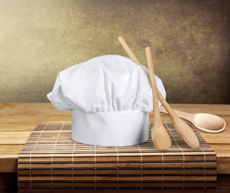 Chef Hat With Wooden Spoons Stock Photo - Image of toque, utensil ...