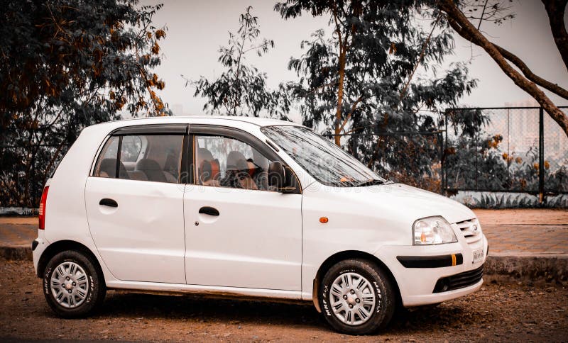 White Hatchback Car Parked Outside the Park Editorial Stock Image ...