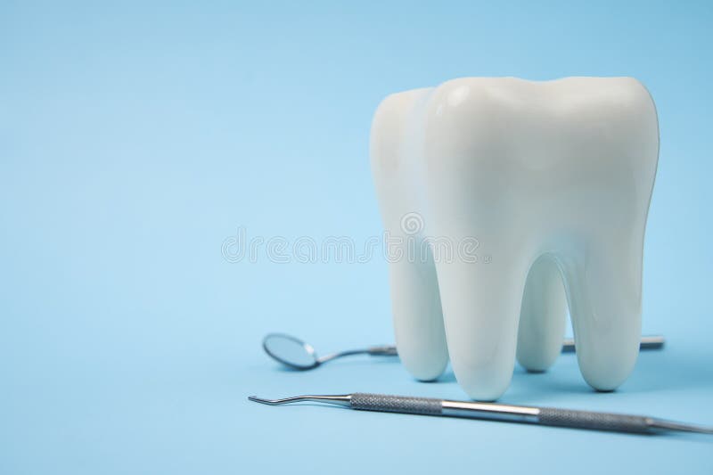 White Healthy Tooth, and Dental Tools for Dentistry Stock Photo - Image ...