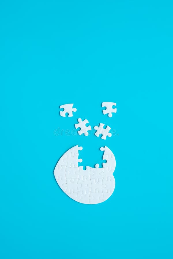 White Heart Shape of Jigsaw Puzzle Pieces on Blue Background. Concepts ...